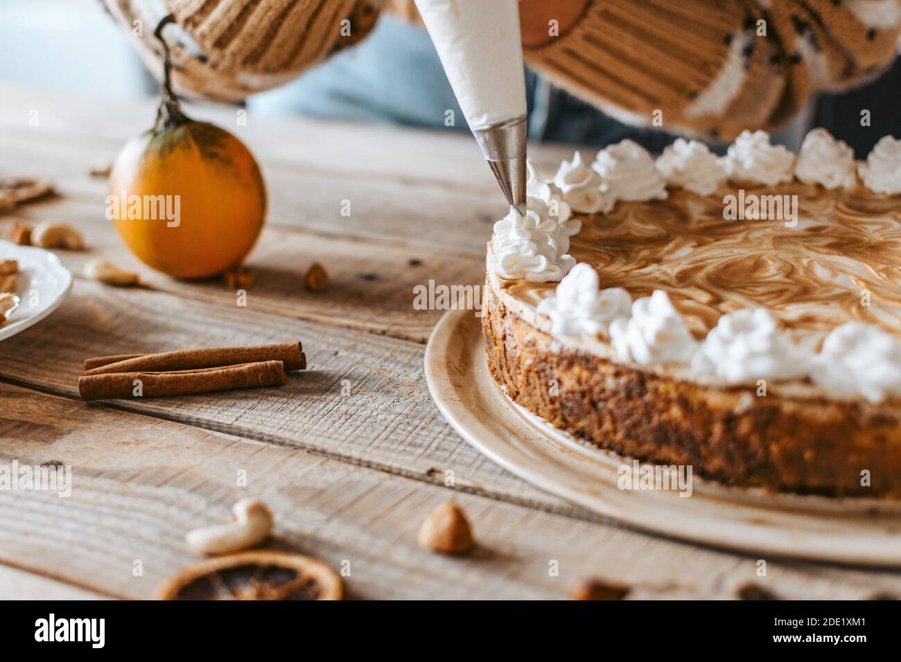 A process of cake decorating Stock Photo - Alamy