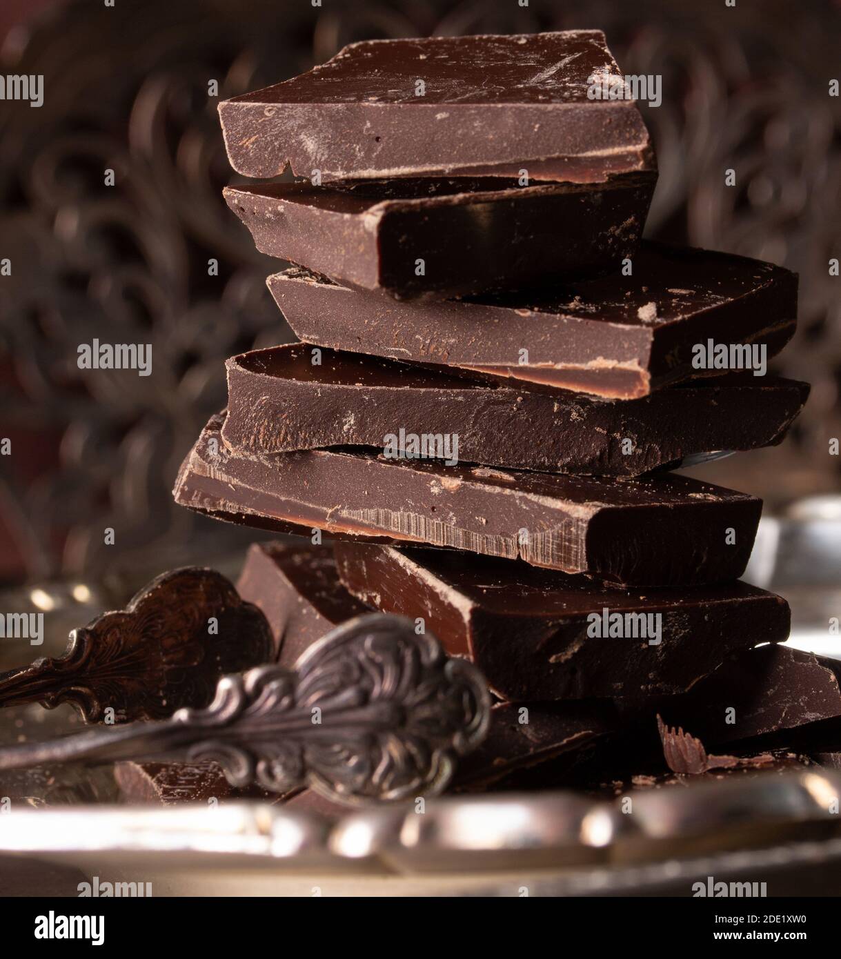 Pieces of delicious dark chocolate stacked on top of each other Stock ...