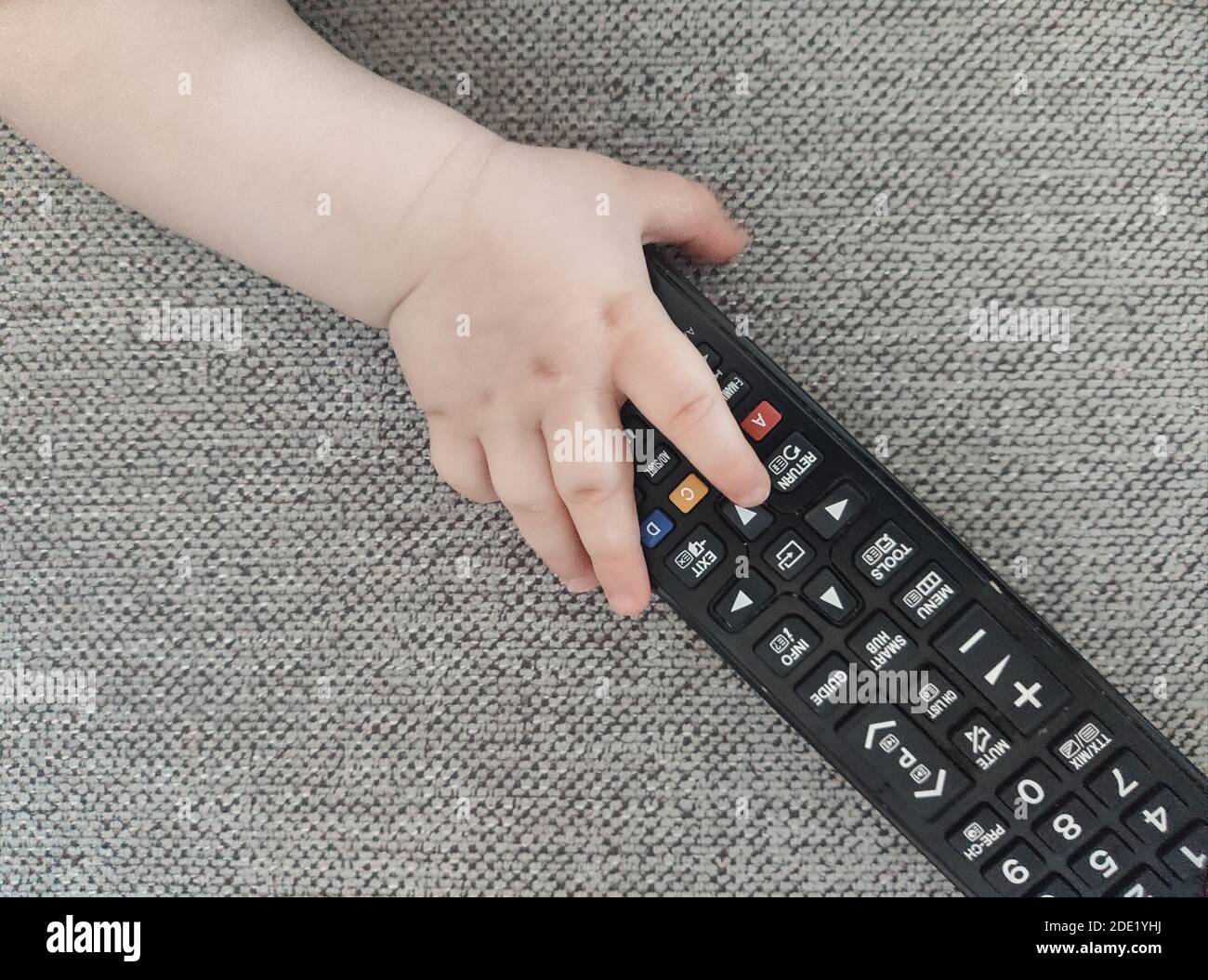 A top view shot of a cute little kid playing with remote control Stock ...