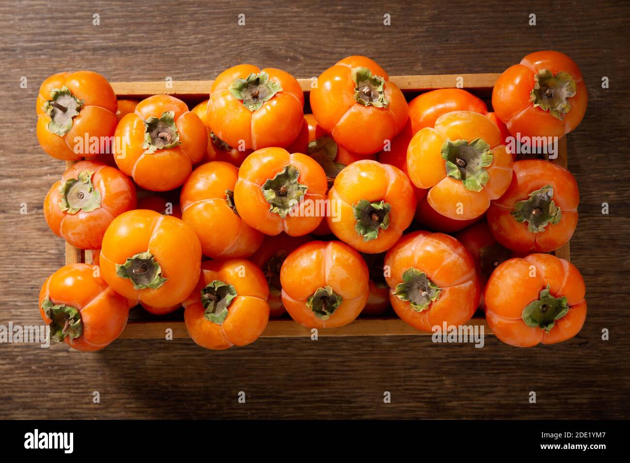 Persimmon in a box hi-res stock photography and images - Alamy