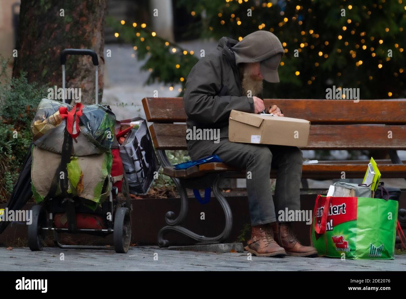 Homeless person with trolley hi-res stock photography and images - Alamy