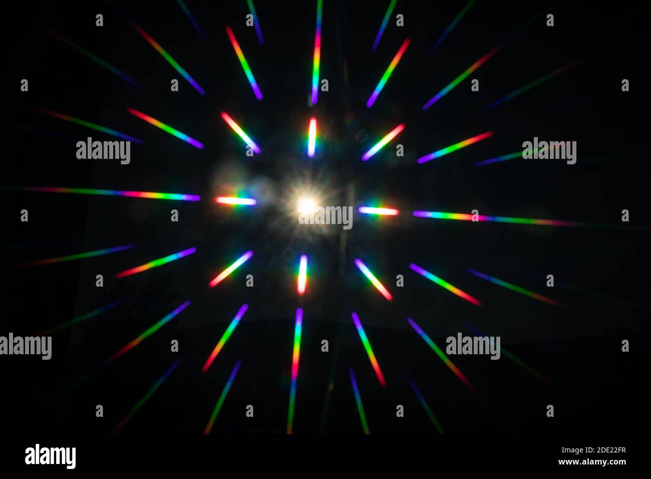 punctiform light source reflects the colors of the rainbow in all ...