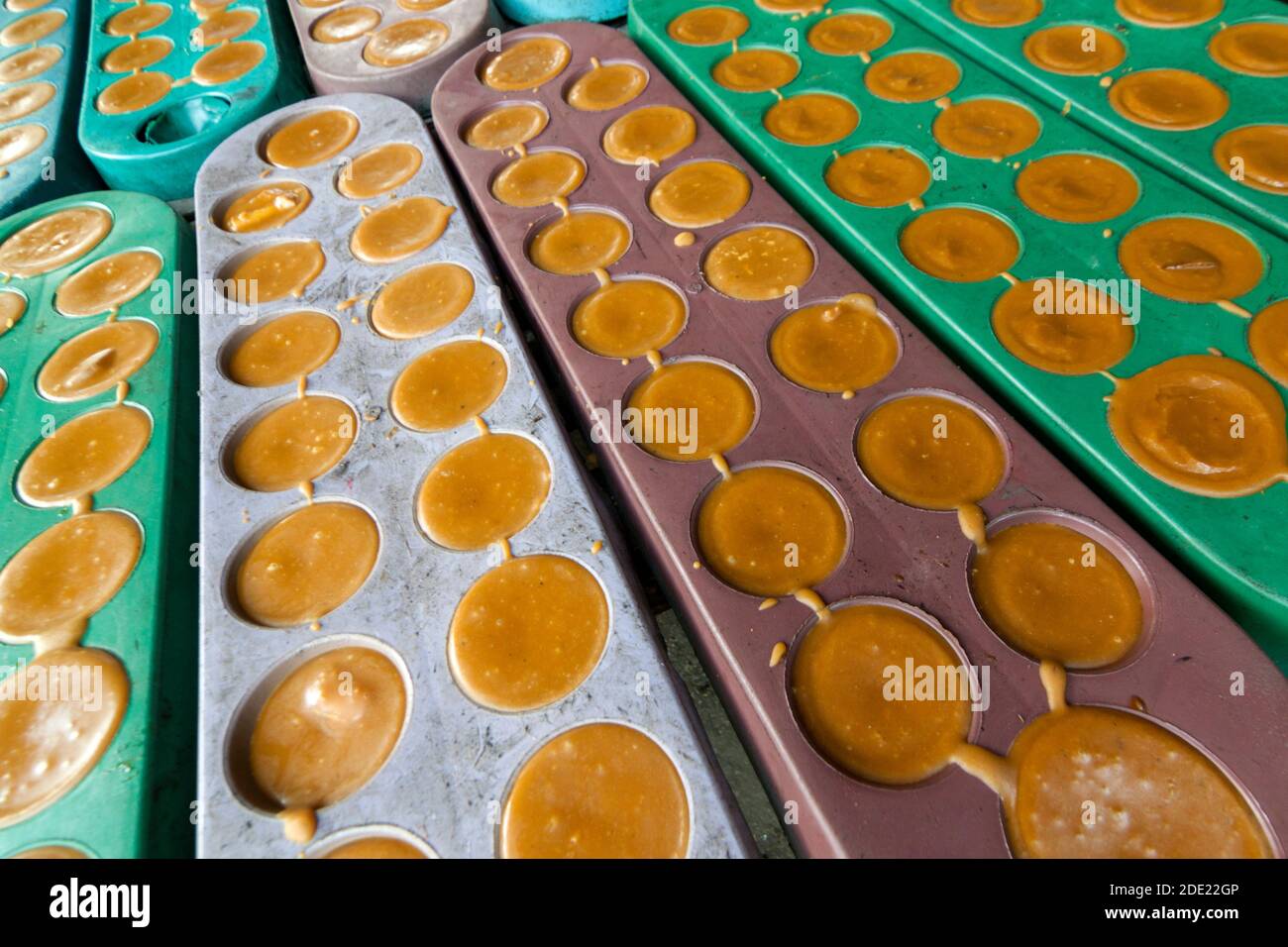 The process of making brown sugar in the traditional way Stock Photo ...