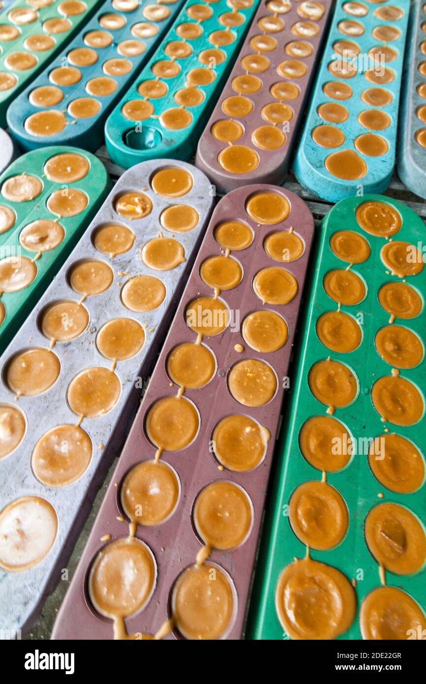 The process of making brown sugar in the traditional way Stock Photo ...