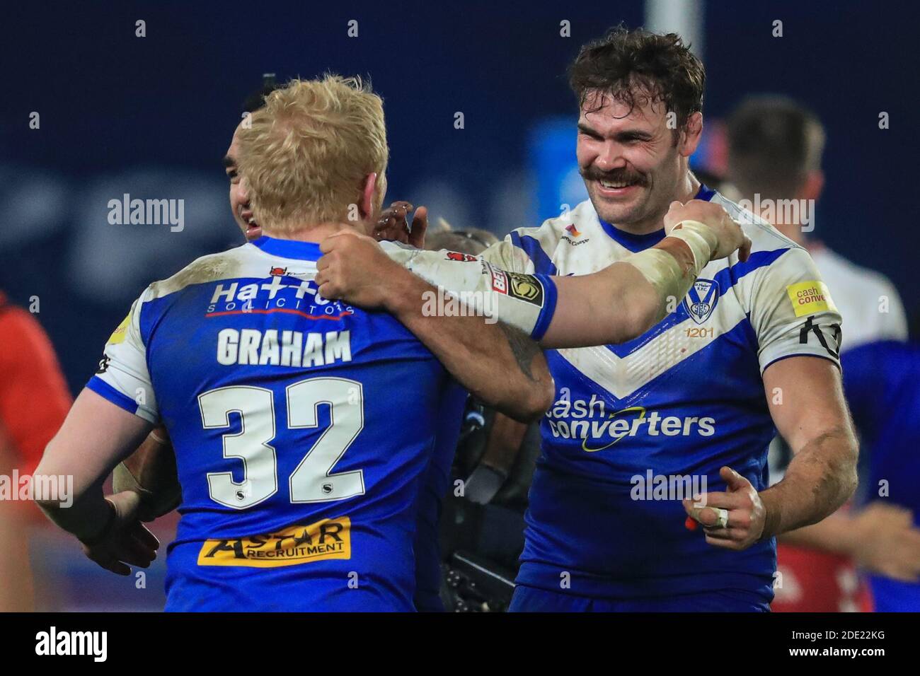 Alex Walmsley (8) of St Helens and James Graham (32) of St Helens ...