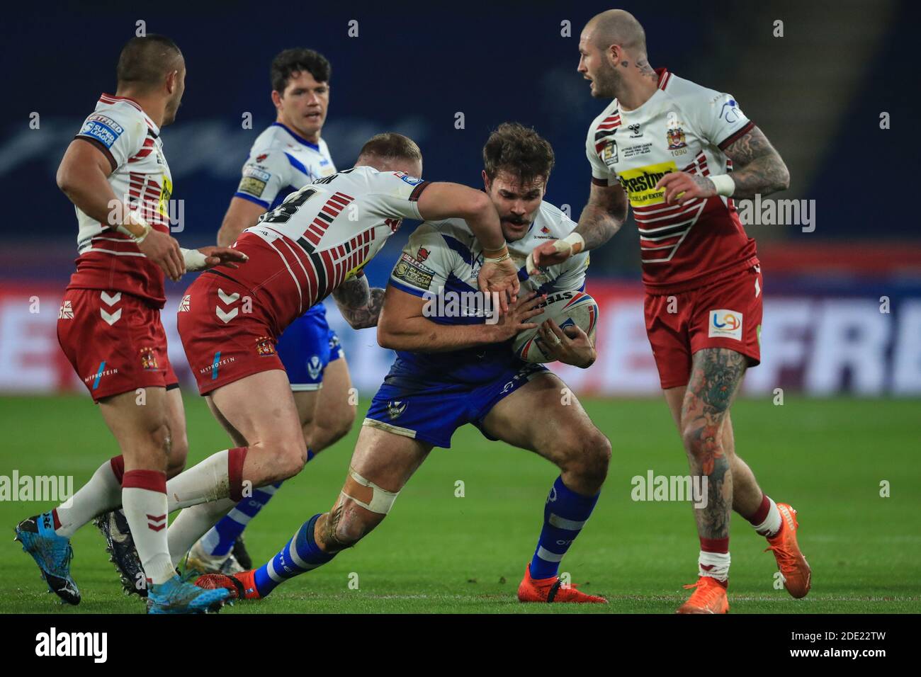 Brad Singleton (38) of Wigan Warriors hits Alex Walmsley (8) of St ...