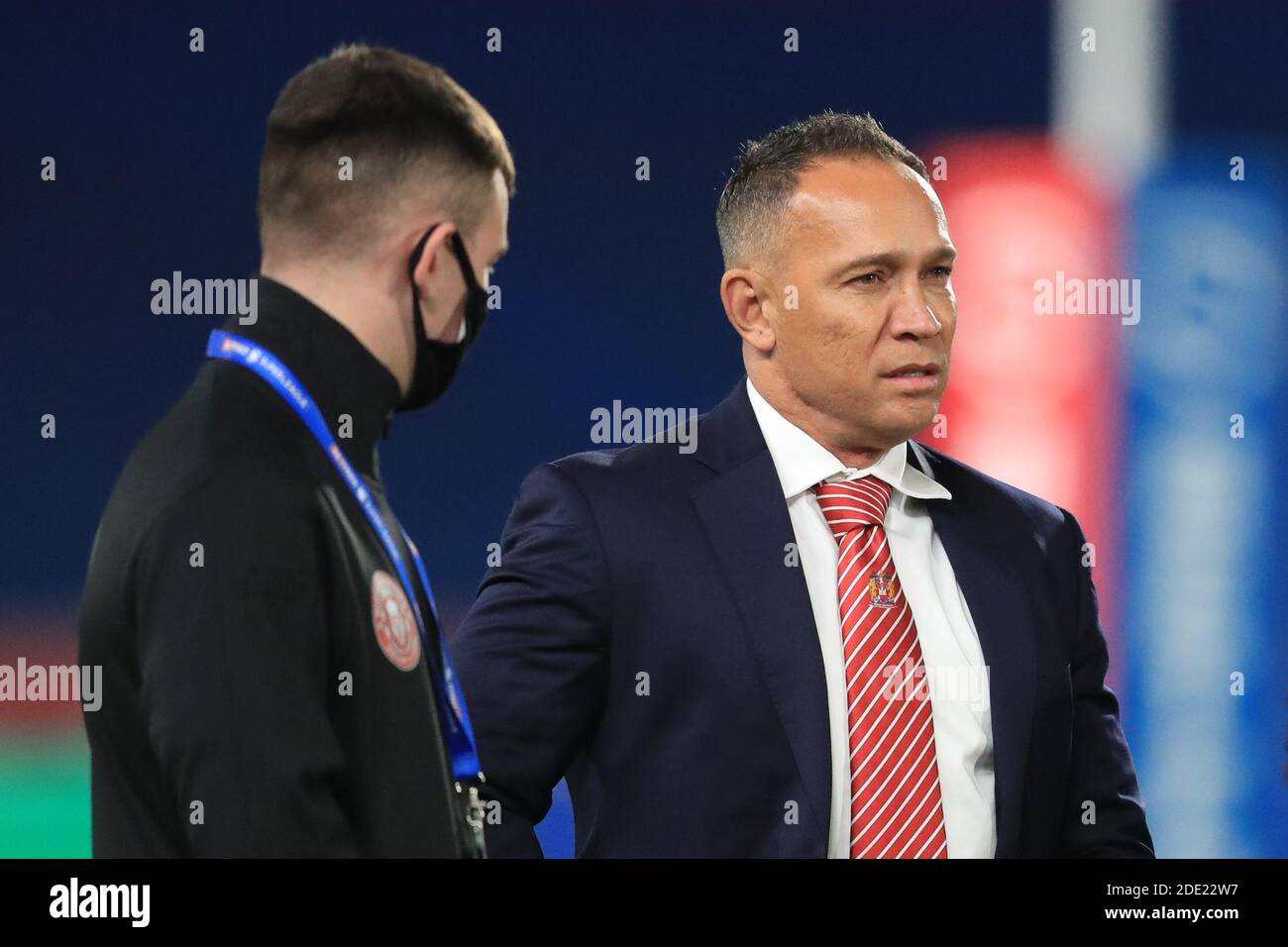 Adrian Lamb Head Coach of Wigan Warriors inspects the pitch with his ...