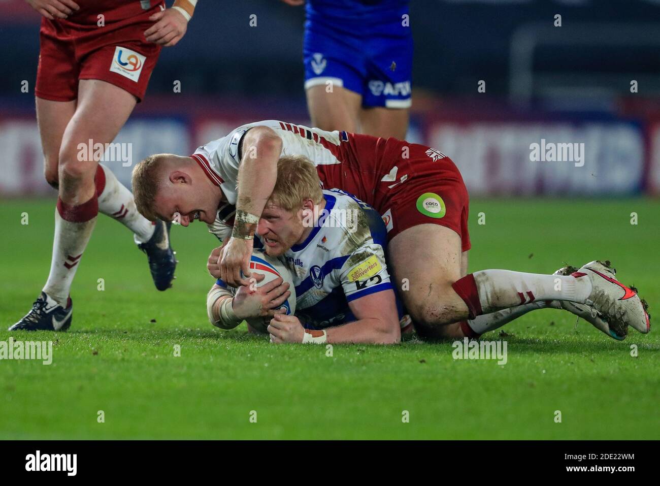 Joe Bullock (19) of Wigan Warriors tackles James Graham (32) of St ...