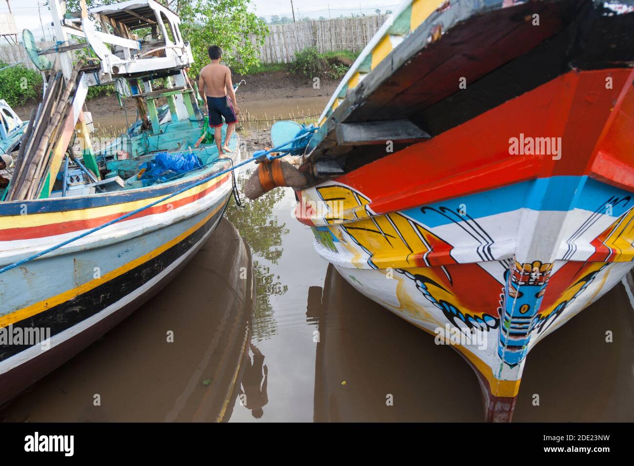 Payangan Beach is a fishing village with traditional boats. The perfect ...