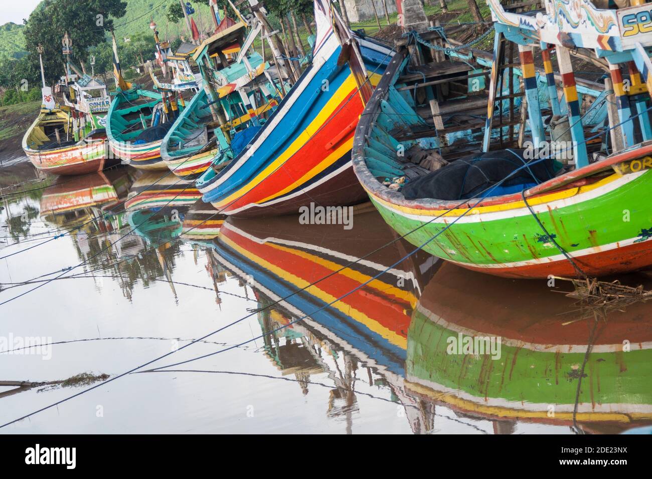Payangan Beach is a fishing village with traditional boats. The perfect ...