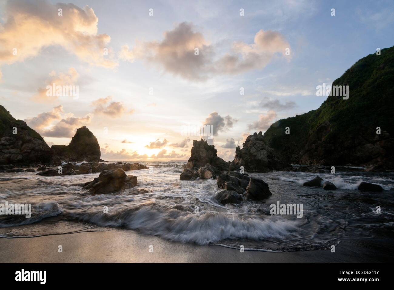 Payangan Beach is a fishing village with traditional boats. The perfect ...