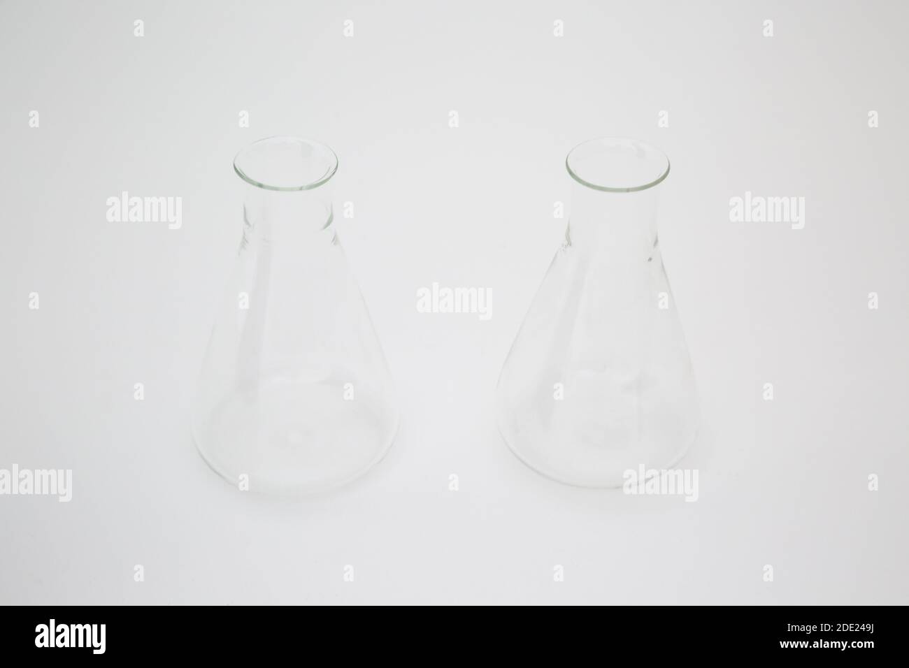 Scientific laboratory glass erlenmeyer flask isolated on white ...