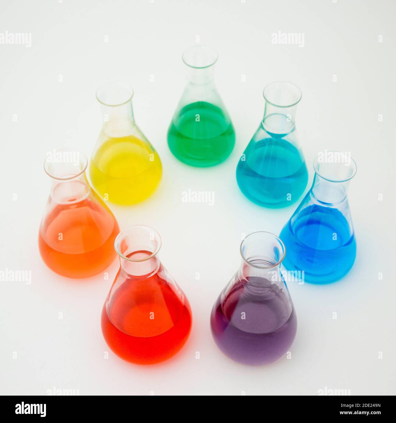 Scientific laboratory glass erlenmeyer flask filled with colorful ...