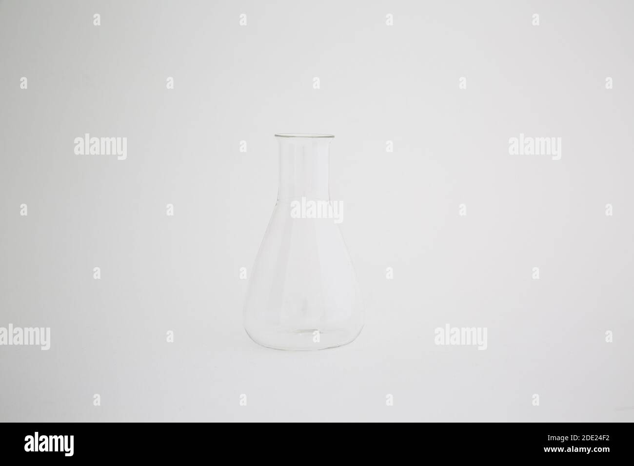 Scientific laboratory glass erlenmeyer flask isolated on white ...