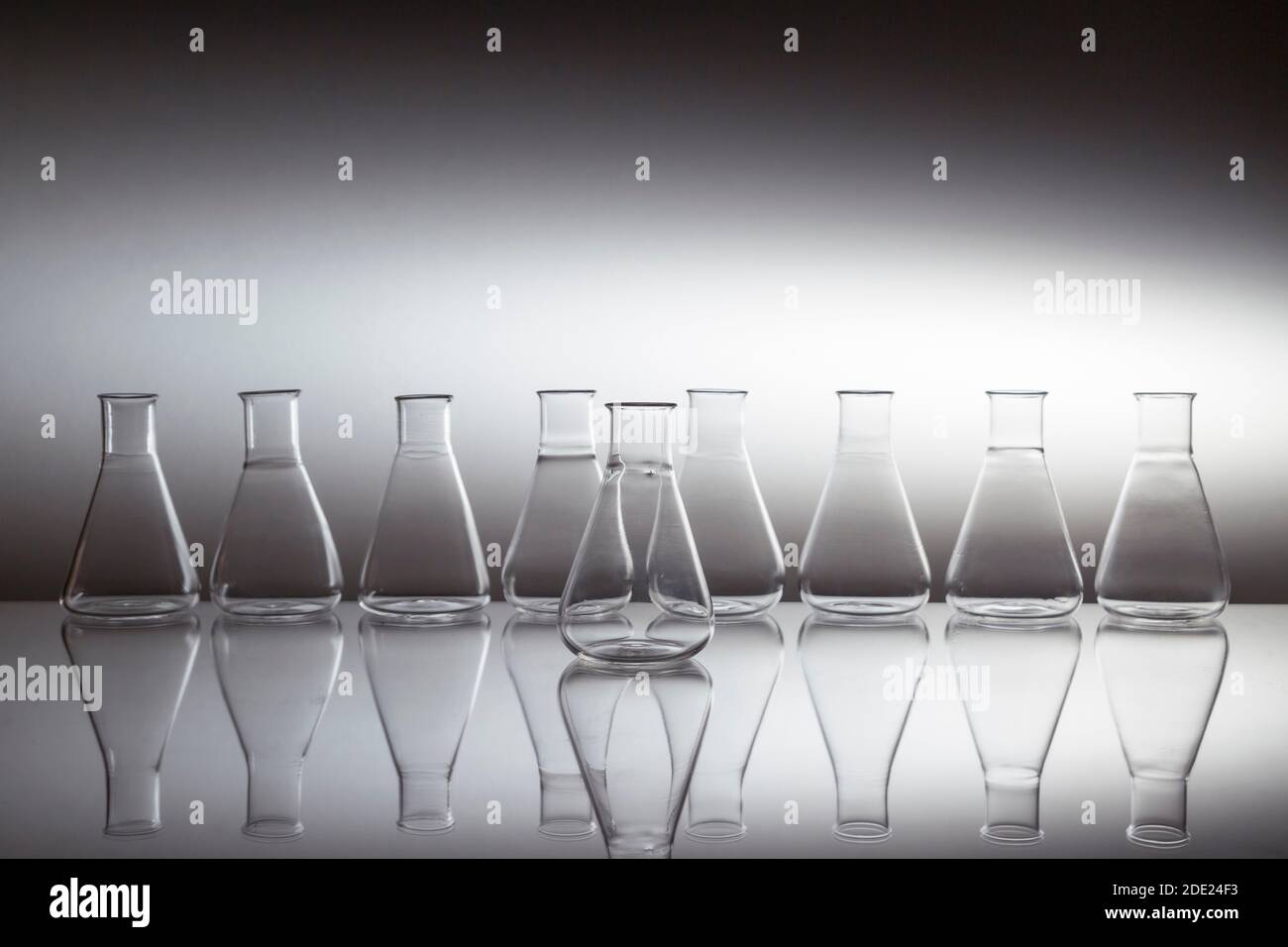 Group of scientific laboratory glass erlenmeyer flask glassware ...