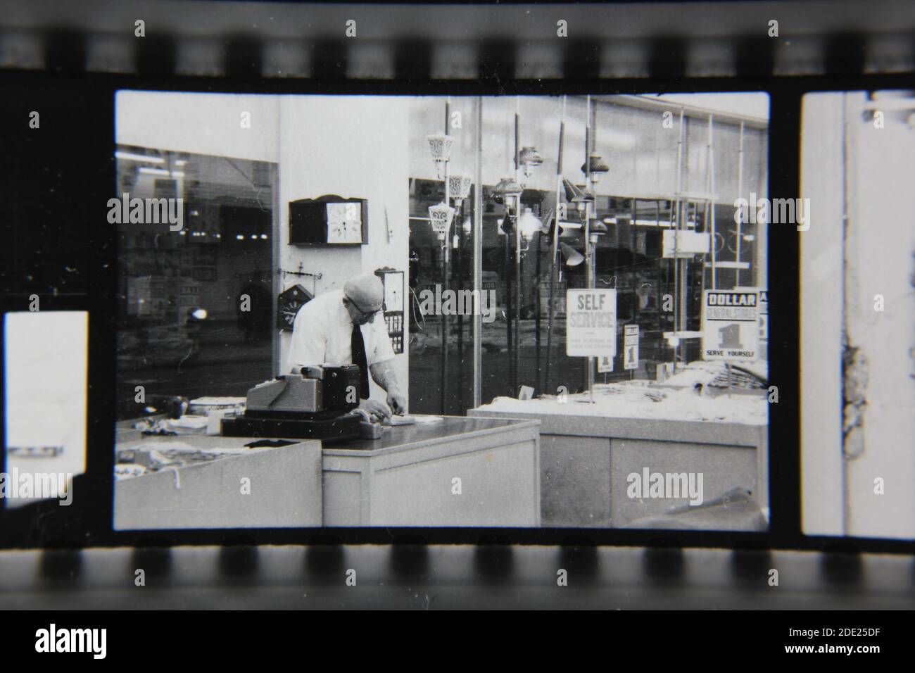 Fine 1970s vintage black and white photography of a regular guy hard at ...