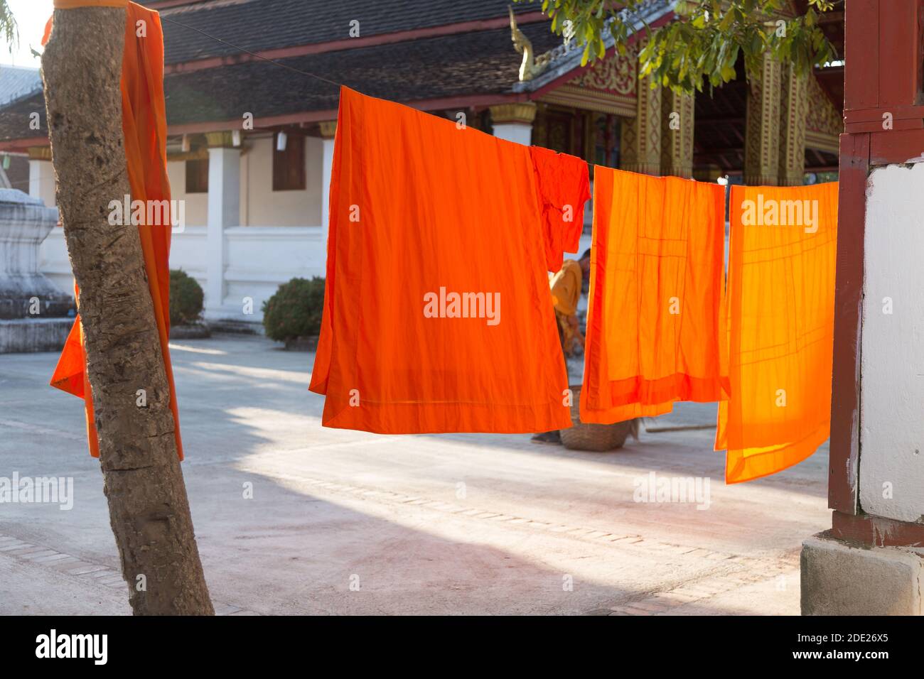 Buddhist monks orange robes drying on washing lines at monastery in ...