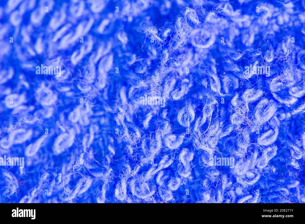 Defocused fluffy wool texture on blur background, abstract blue color ...