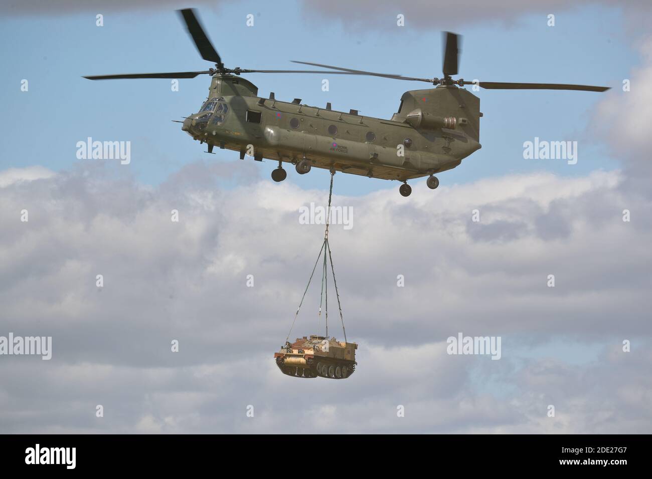 Boeing CH-47 Chinook transporting an armoured vehicle at RAF Benson, UK ...