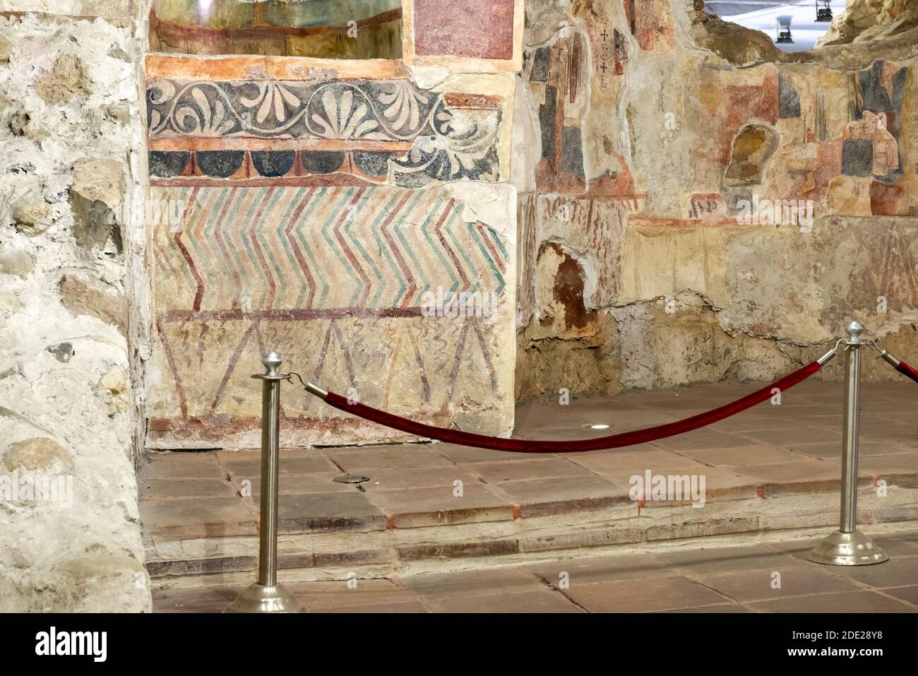 The altar and preserved frescoes of 4th Century church at the Ancient ...