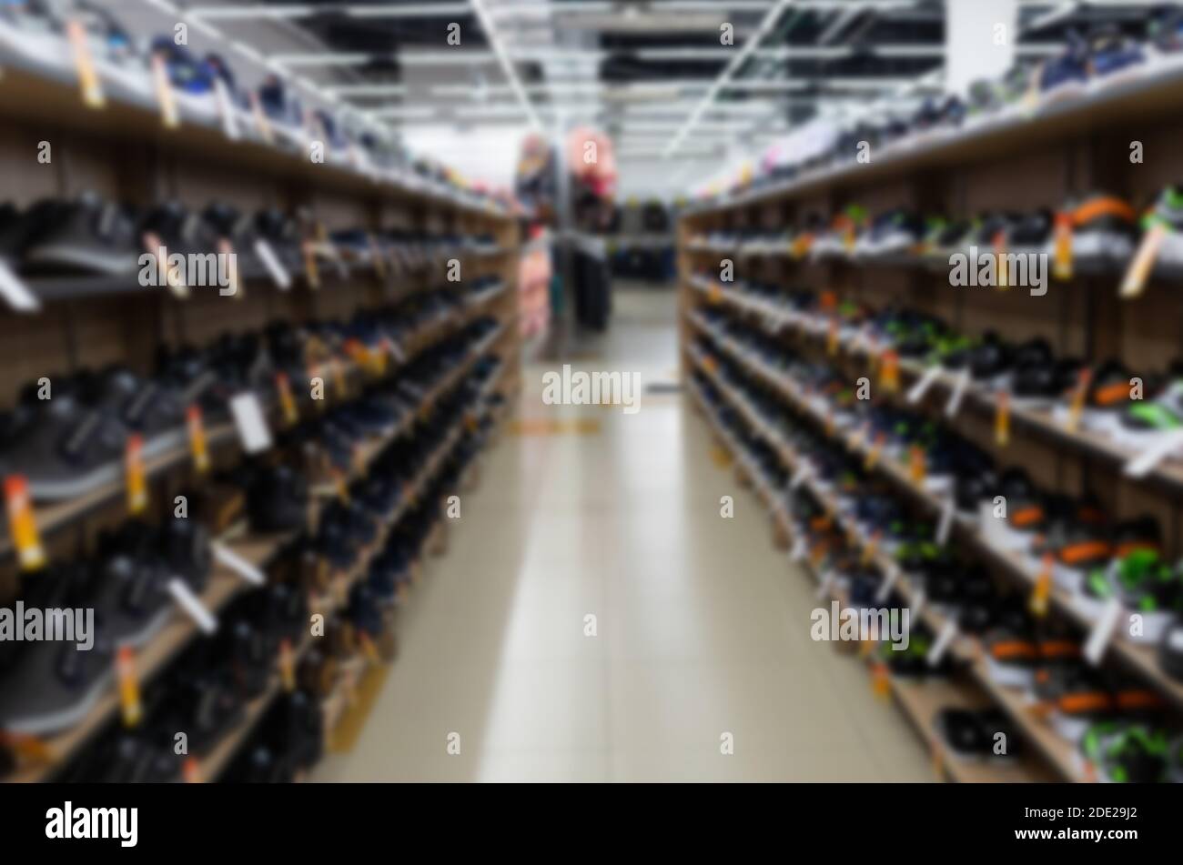 Trainers on display in shop hi-res stock photography and images - Alamy