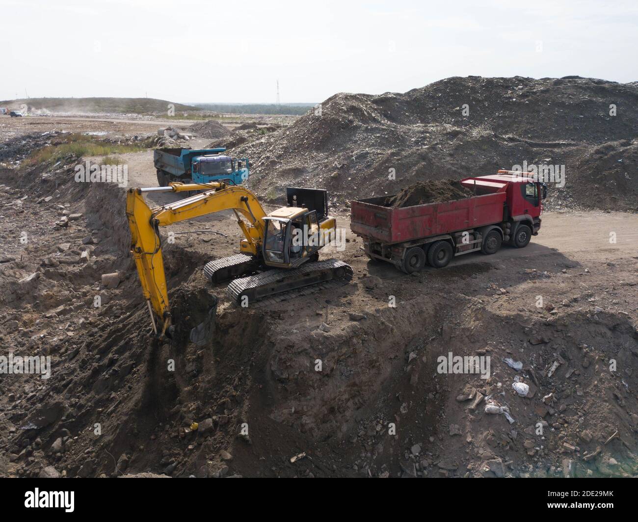 Construction works. Earthmoving at open pit mining. Heavy equipment ...