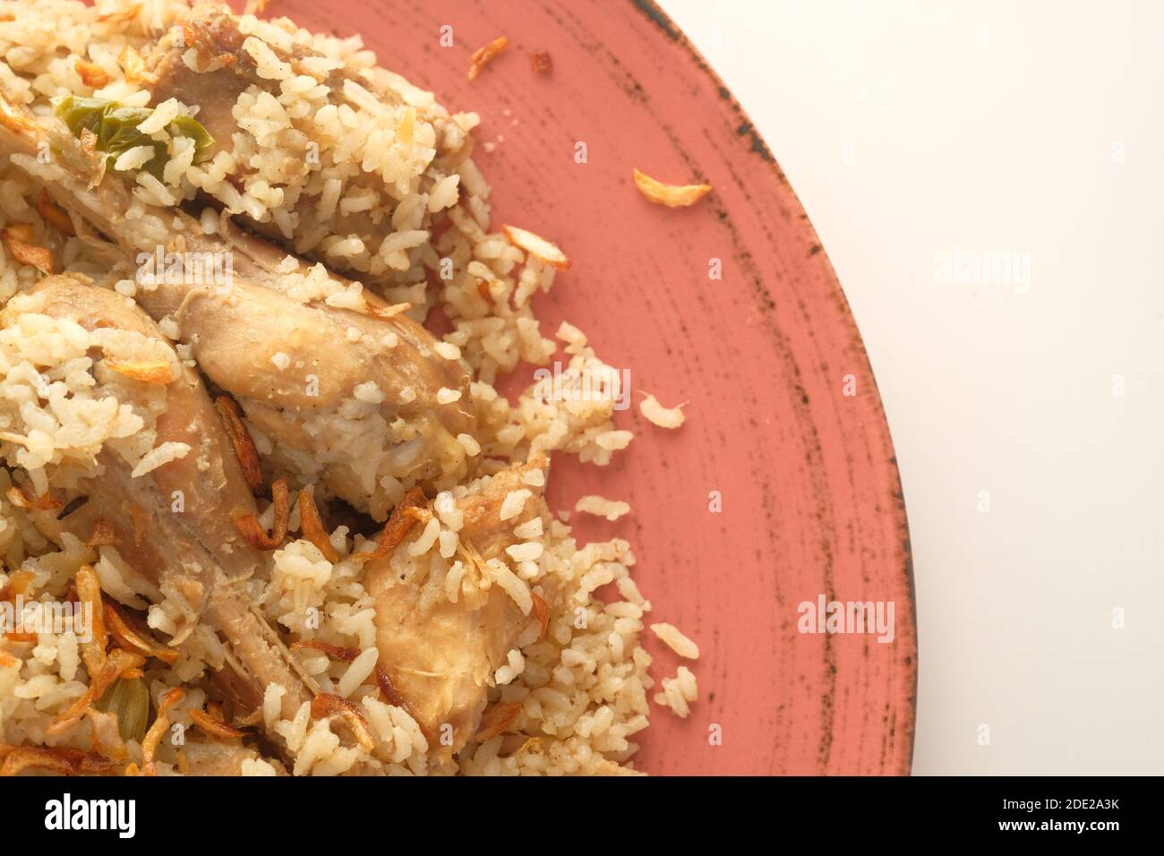 chicken biryani meal in a bowl on table Stock Photo - Alamy