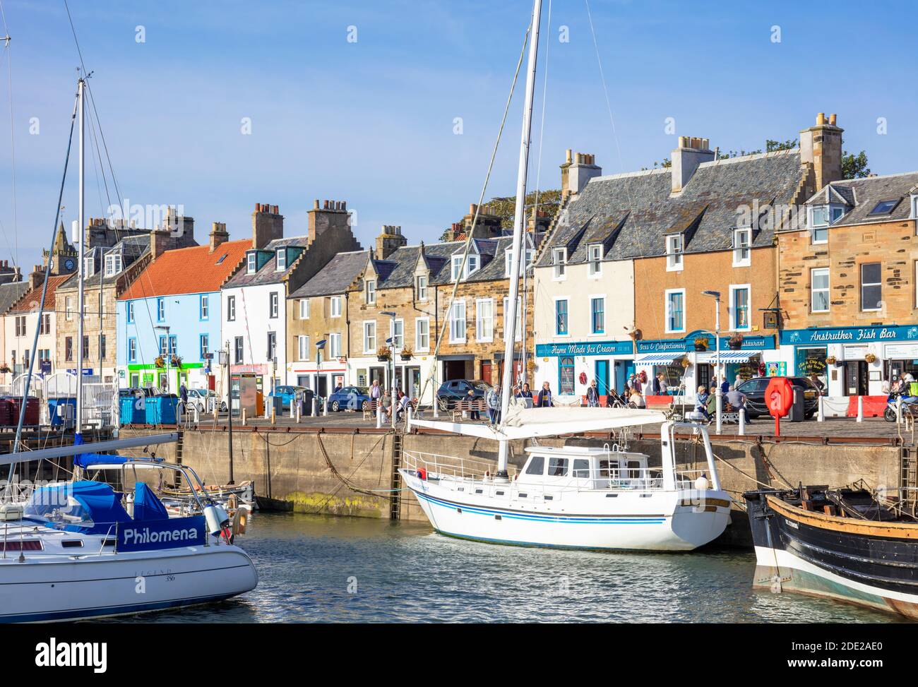 Fishing boats and yachts in the scottish coastal port of Anstruther ...