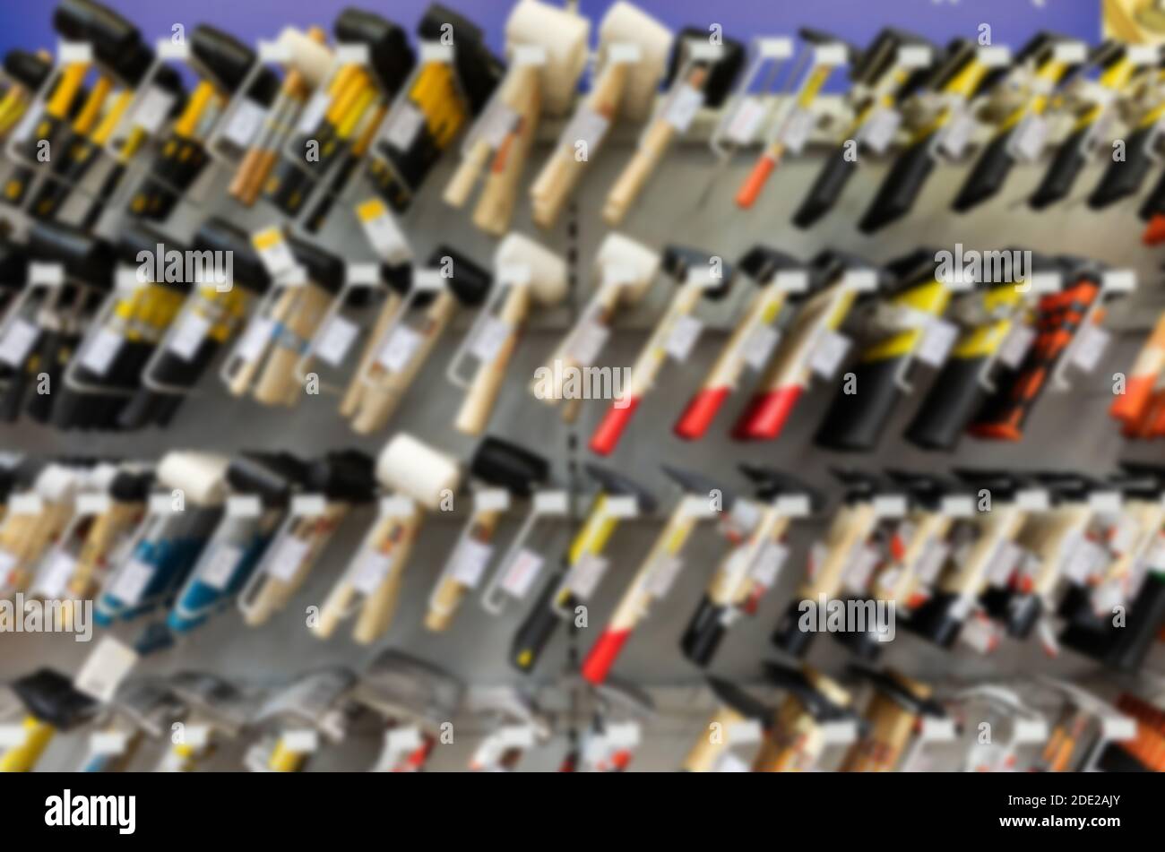 blurred and defocused: hardware store with tool counters including ...