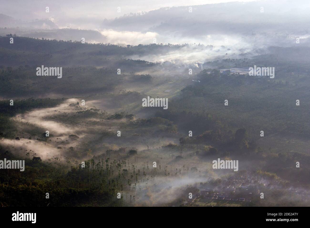 Beautiful sunrise on Puncak Megasari Stock Photo - Alamy