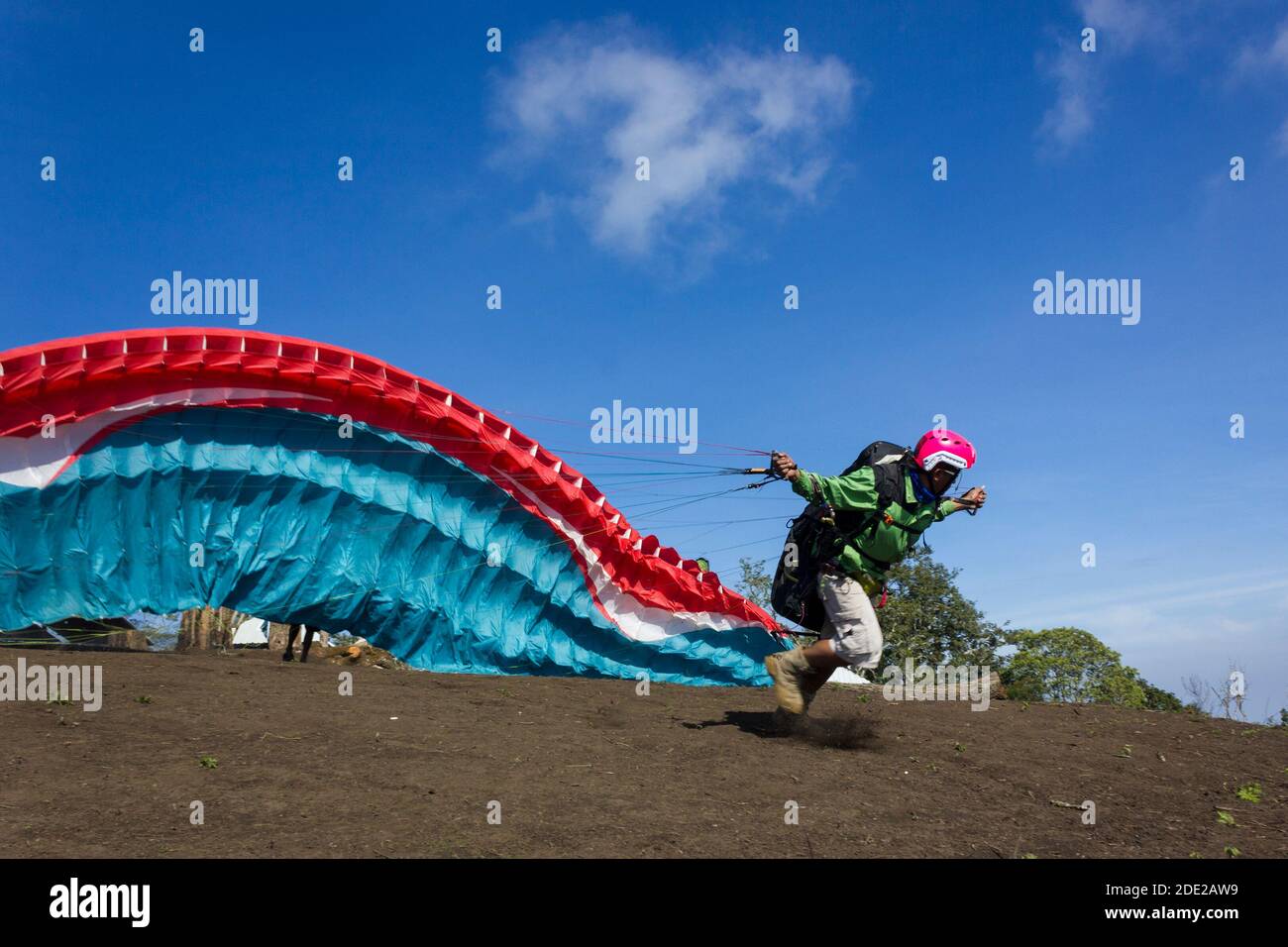 Puncak Megasari is a favorite place for paragliding activities Stock ...