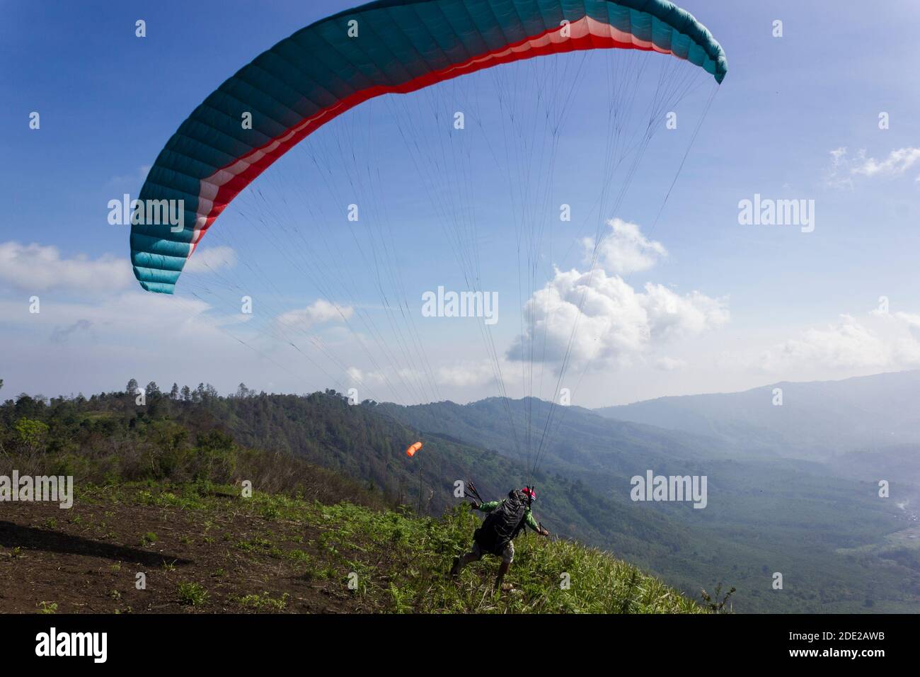 Puncak Megasari is a favorite place for paragliding activities Stock ...