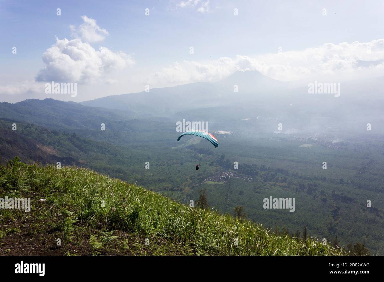 Puncak Megasari is a favorite place for paragliding activities Stock ...