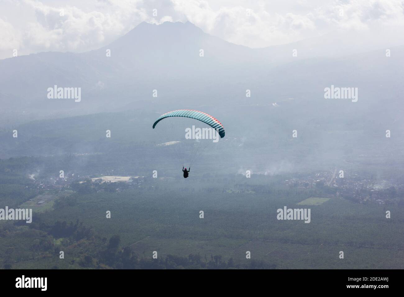Puncak Megasari is a favorite place for paragliding activities Stock ...