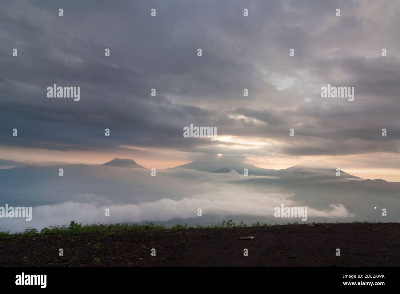 Beautiful sunrise on Puncak Megasari Stock Photo - Alamy