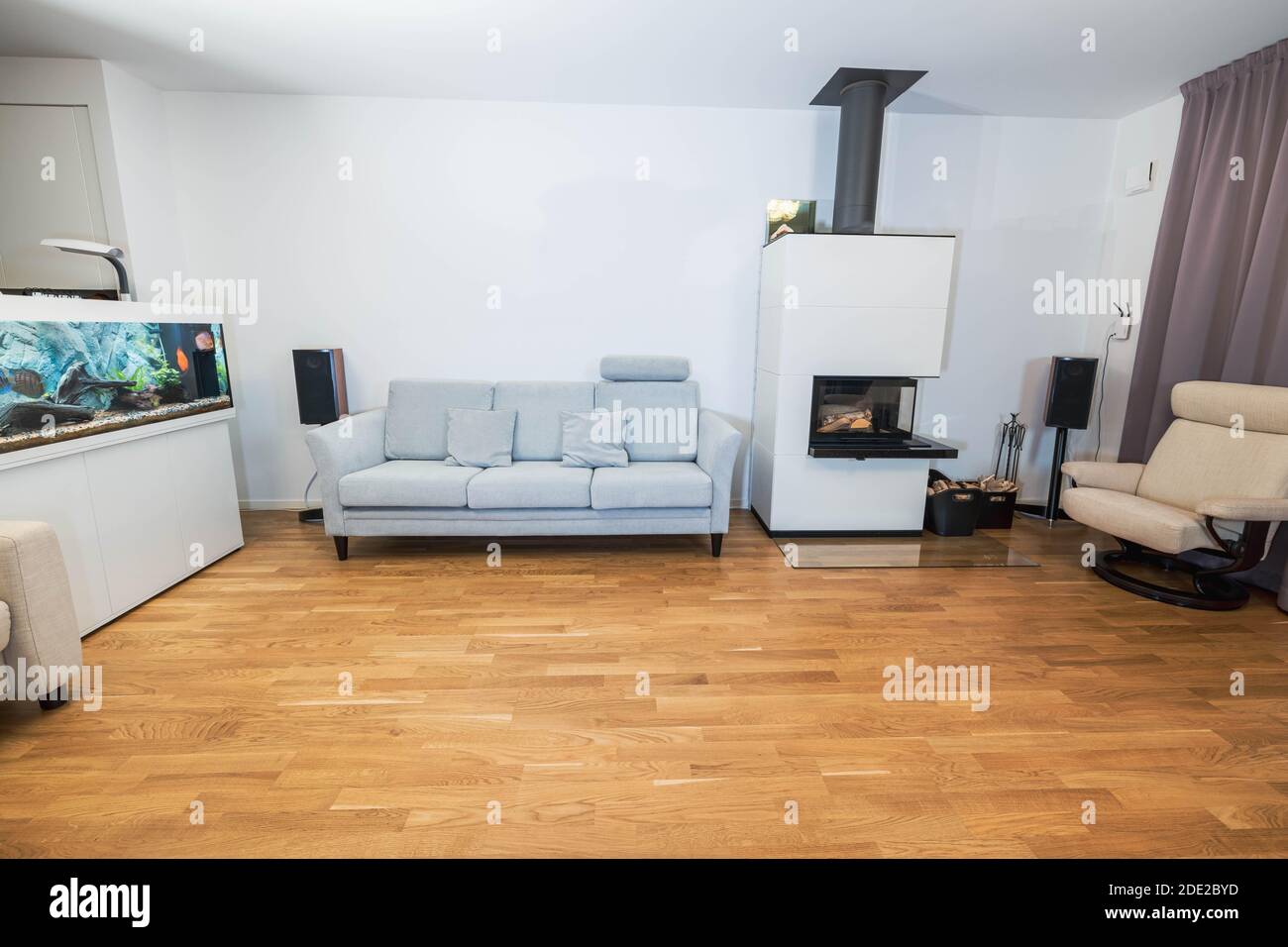 Beautiful view of interior of modern living room. White fireplace, big ...