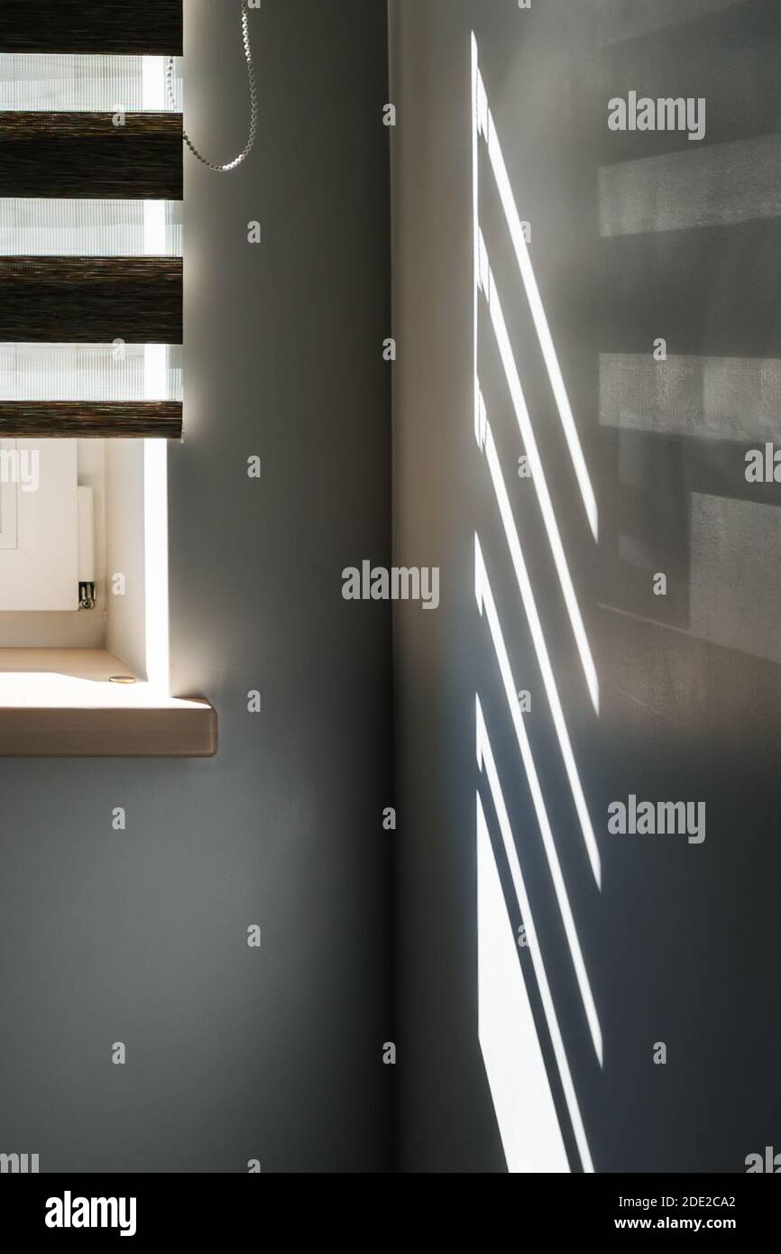 Play of shadow on the wall in bathroom Stock Photo - Alamy