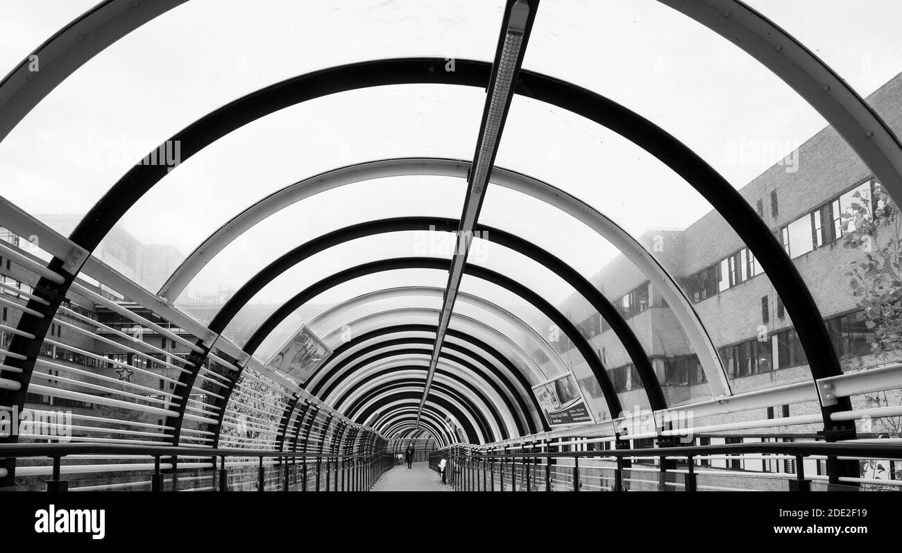 Modern tubular concourse tunnel Stock Photo - Alamy