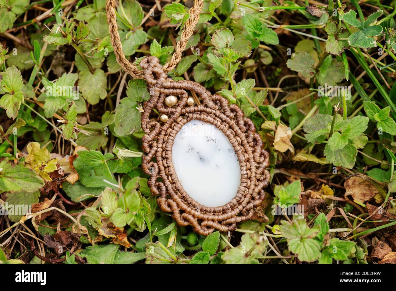 Mineral gemstone ornamental pendant on natural background Stock Photo ...