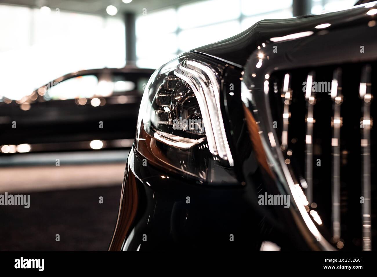 headlight and mask of a luxury car Stock Photo - Alamy