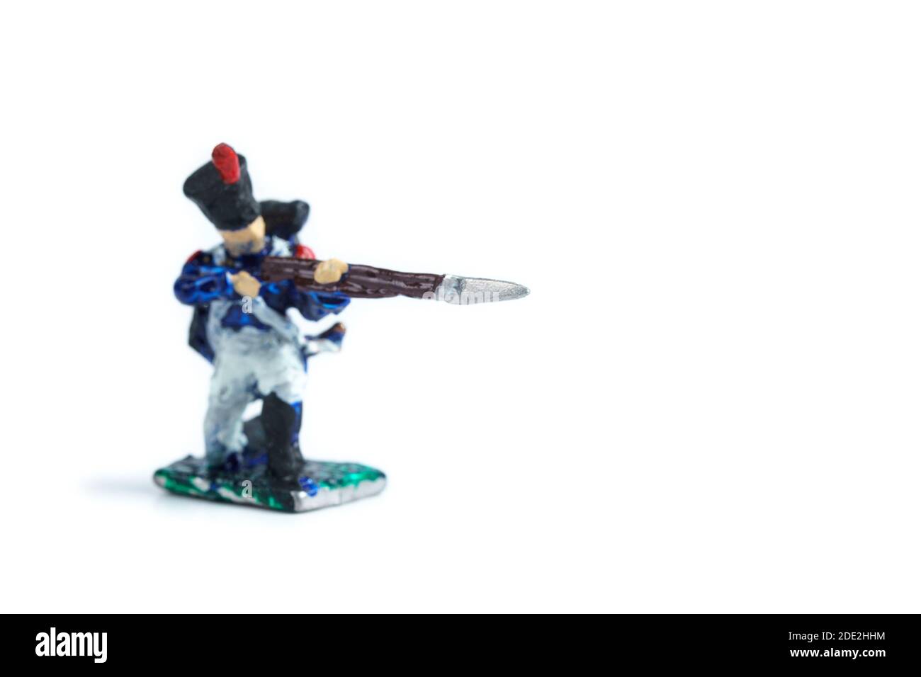 Shot of handmade metal soldier's figurine on the white background Stock ...