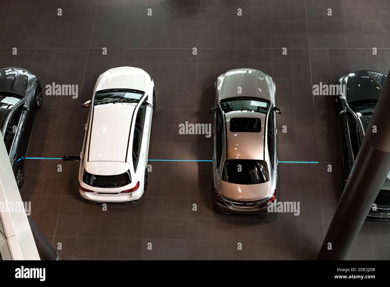 new modern car models in the showroom Stock Photo - Alamy