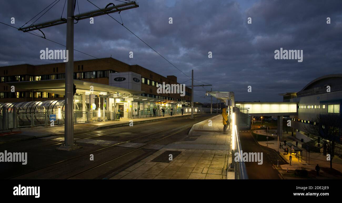 Modern tram station at night Stock Photo - Alamy