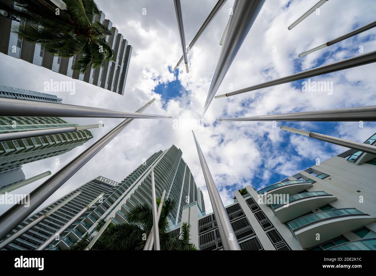 Ground angle looking up steel beams and highrise towers edge ...