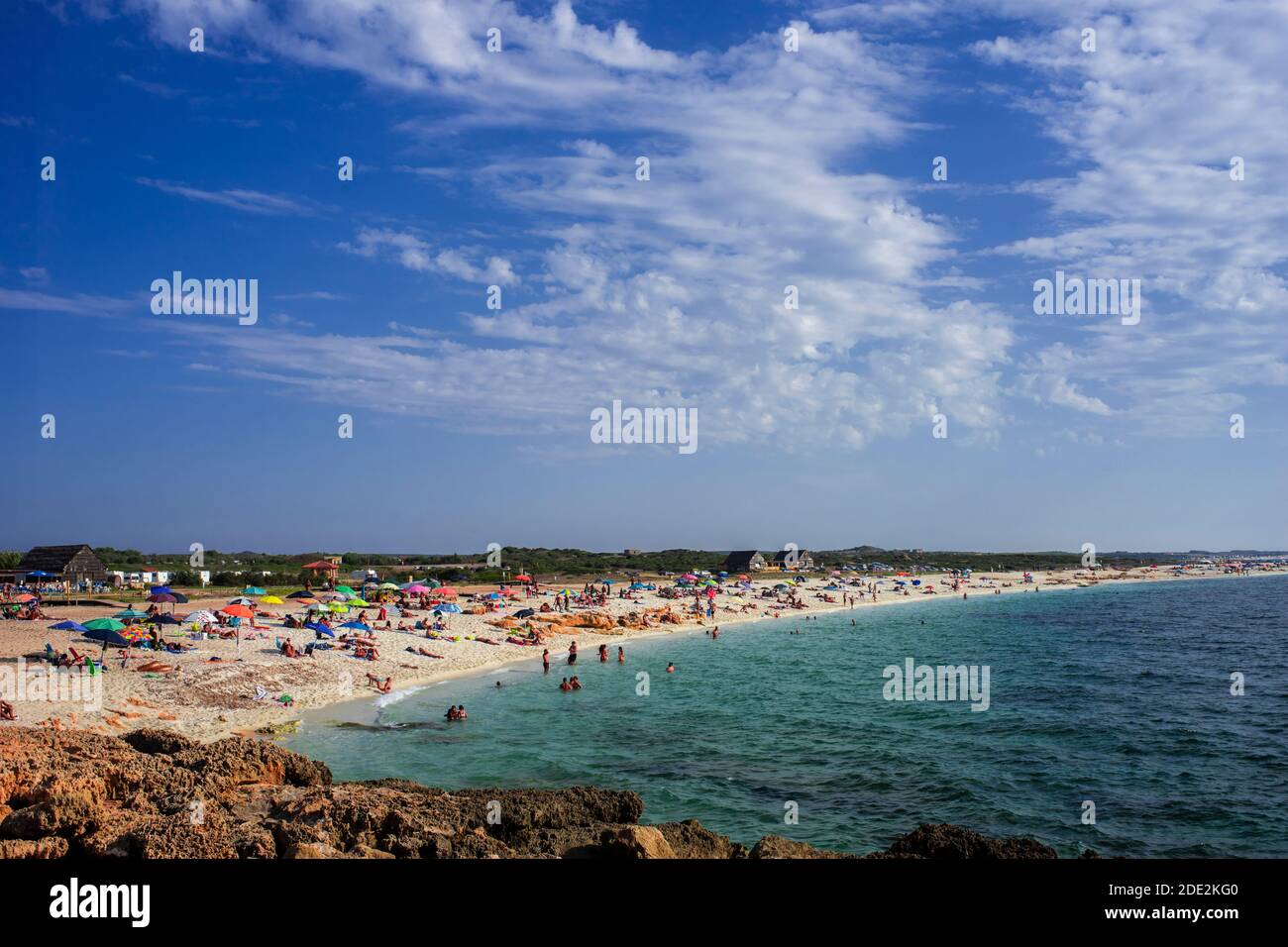 the sand, colored quartz grains enhance this beach, and give the sea a ...