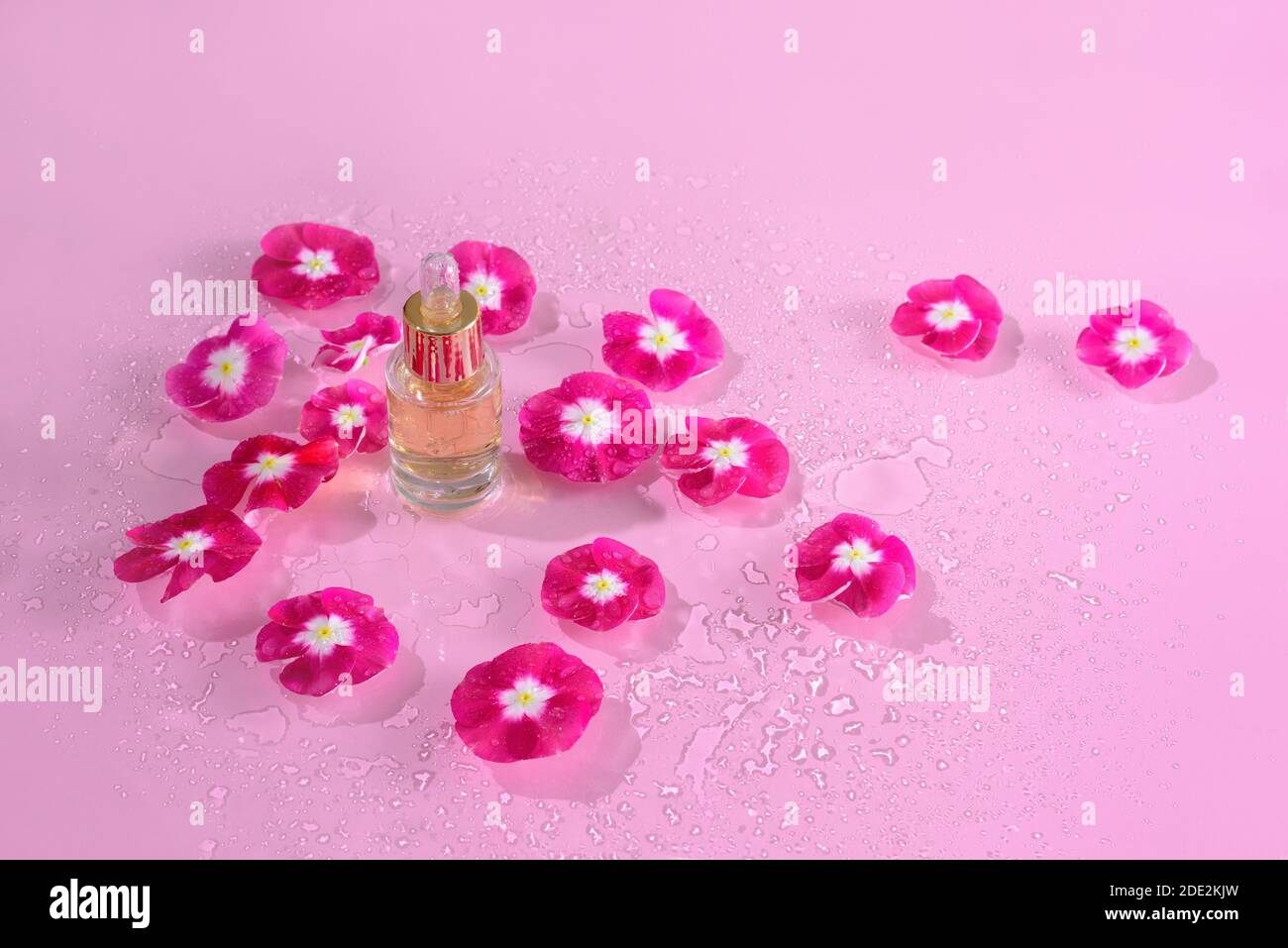 glass bottle of cosmetics serum with pipette, facial essence on a ...