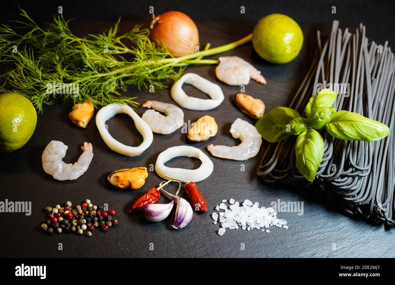 Spaghetti Rigate - black pasta with mixed seafood Stock Photo - Alamy