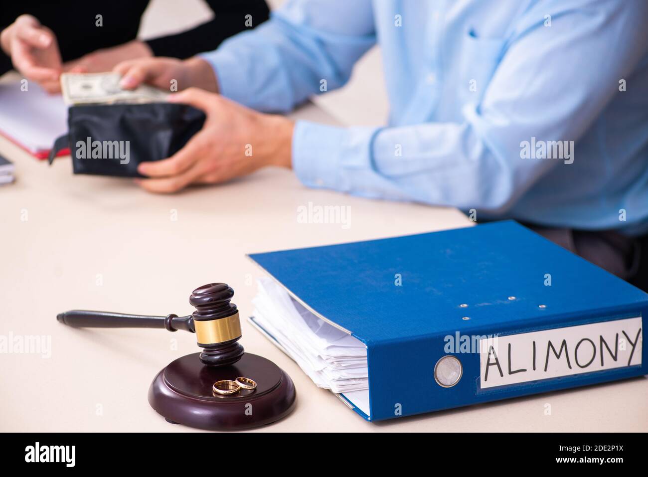 Couple divorcing in alimony concept Stock Photo - Alamy