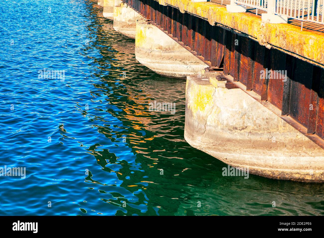 Concrete bridge columns in the river water Stock Photo - Alamy