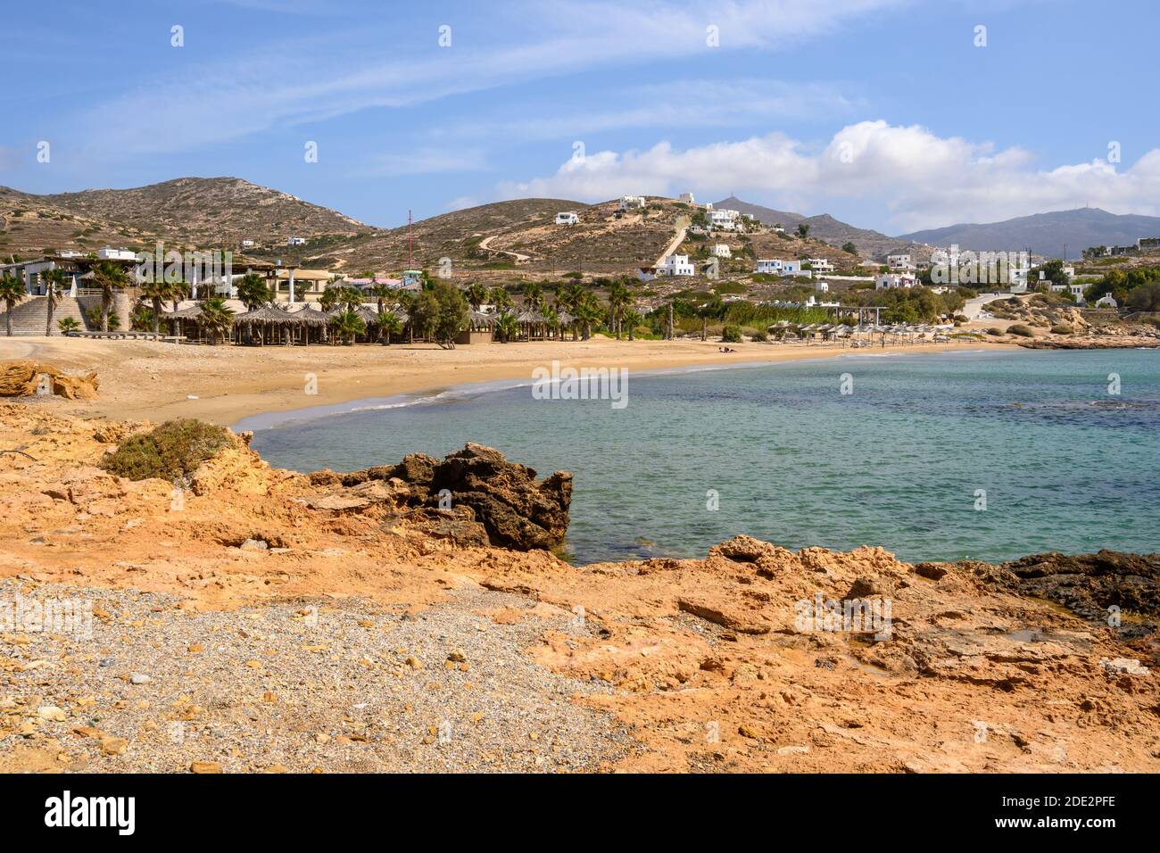 Koumbara beach with golden sand and white pebbles on Ios Island. Greece ...